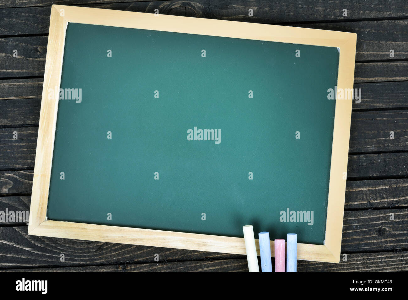 School board on wooden table Stock Photo - Alamy