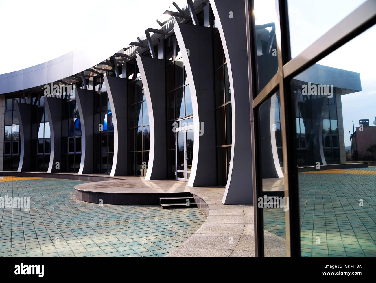 Design of windows and enter area in a modern building Stock Photo - Alamy