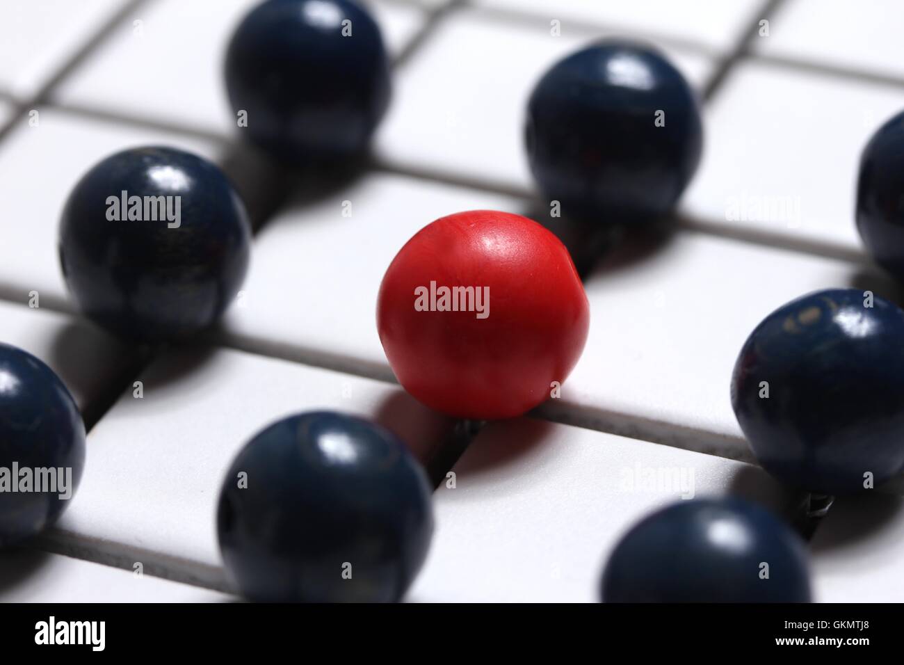 red sphere in the middle Stock Photo - Alamy