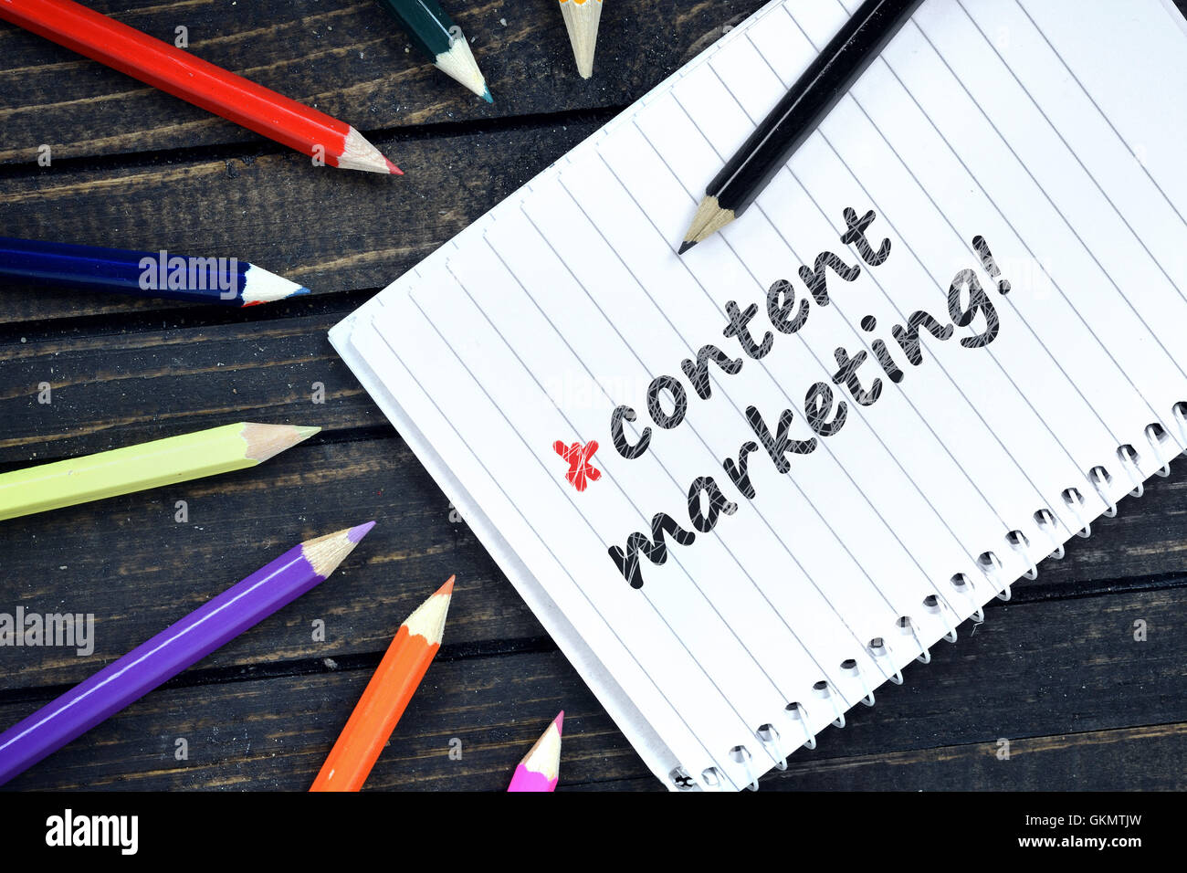 Contact Marketing text on notepad and colorful pencils Stock Photo - Alamy