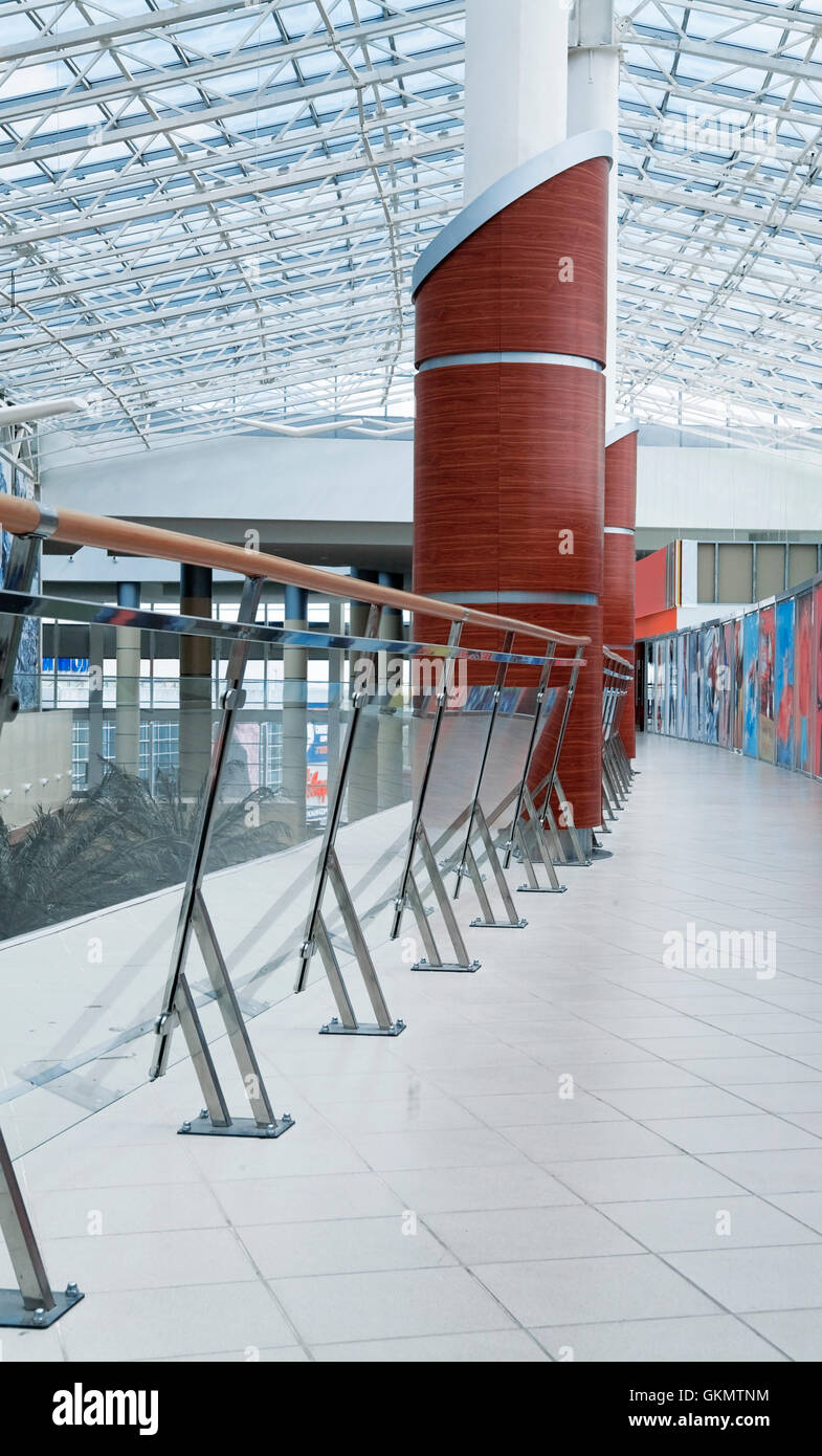 hall of modern office building with a glass handrail and a column Stock ...
