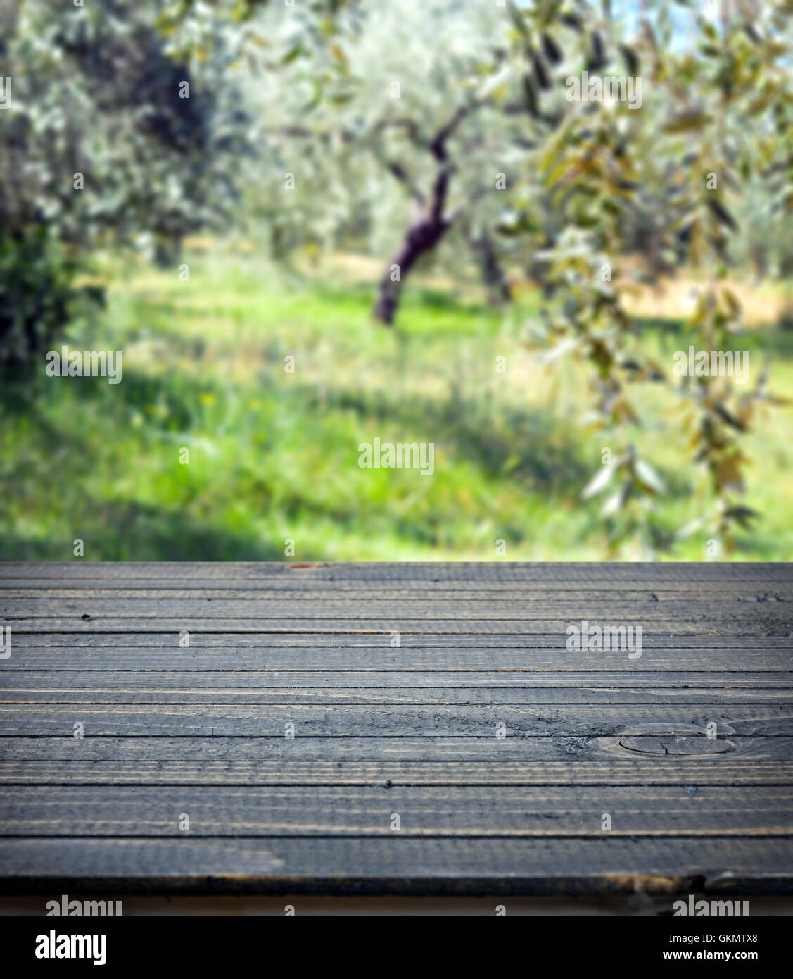 Empty wooden table in rural outdoor scene Stock Photo - Alamy