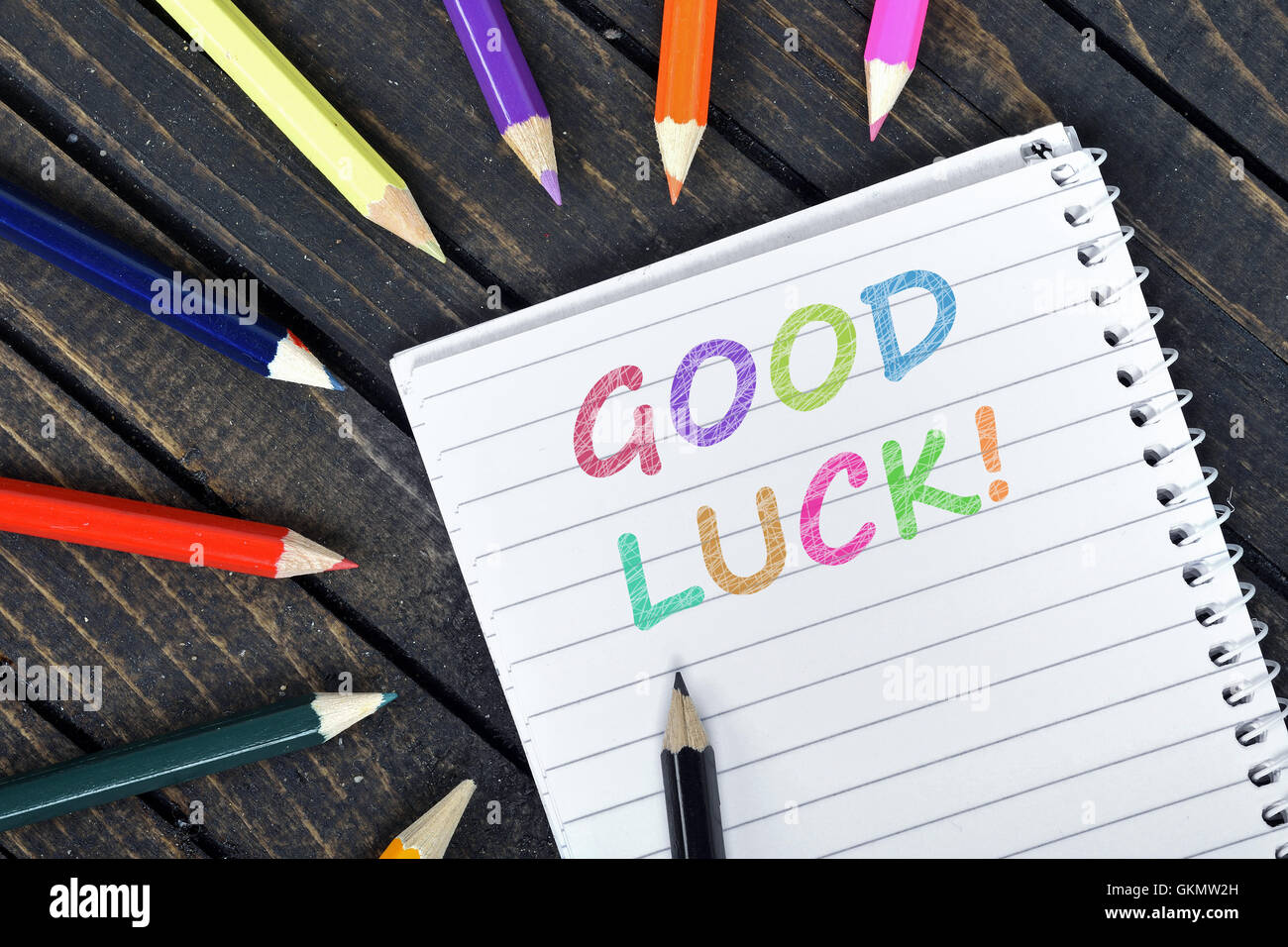 Good Luck text on notepad and colorful pencils Stock Photo - Alamy