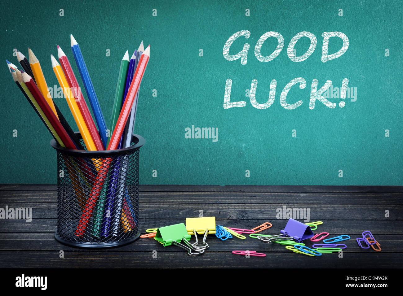 Good luck text on green board and group of pencils Stock Photo - Alamy