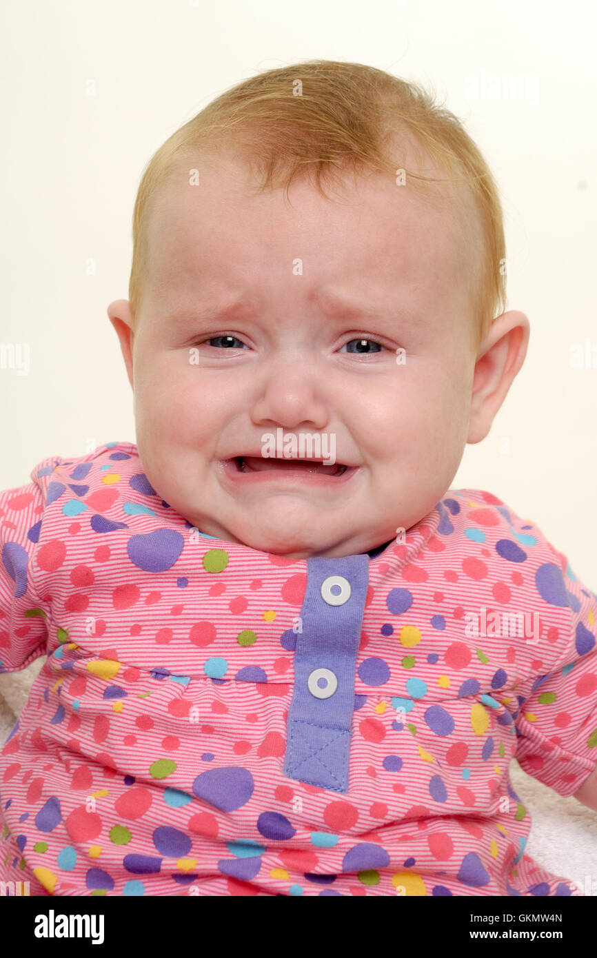 Sad crying baby Stock Photo - Alamy