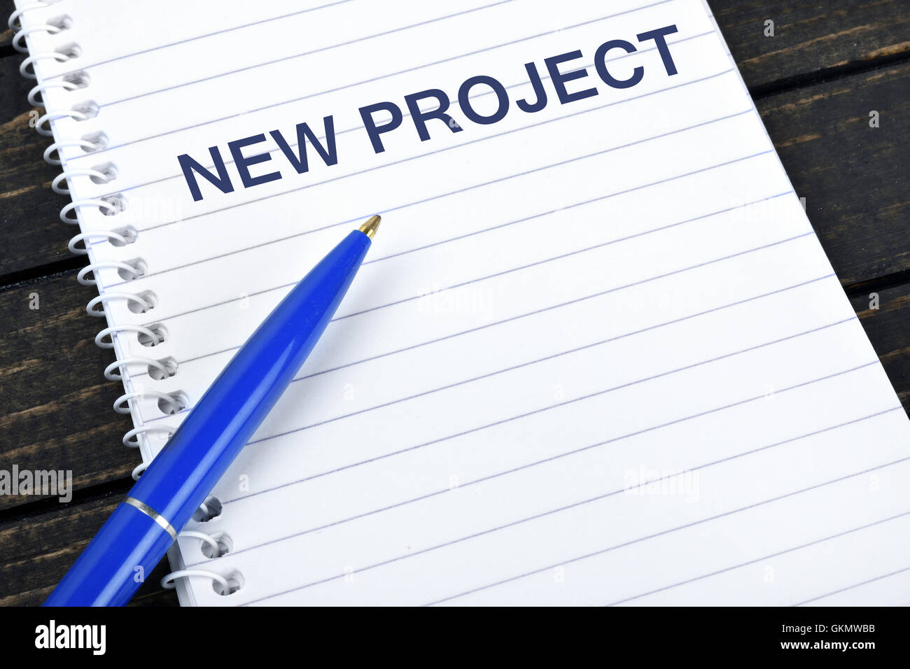 New Project text on notepad and blue pen Stock Photo - Alamy