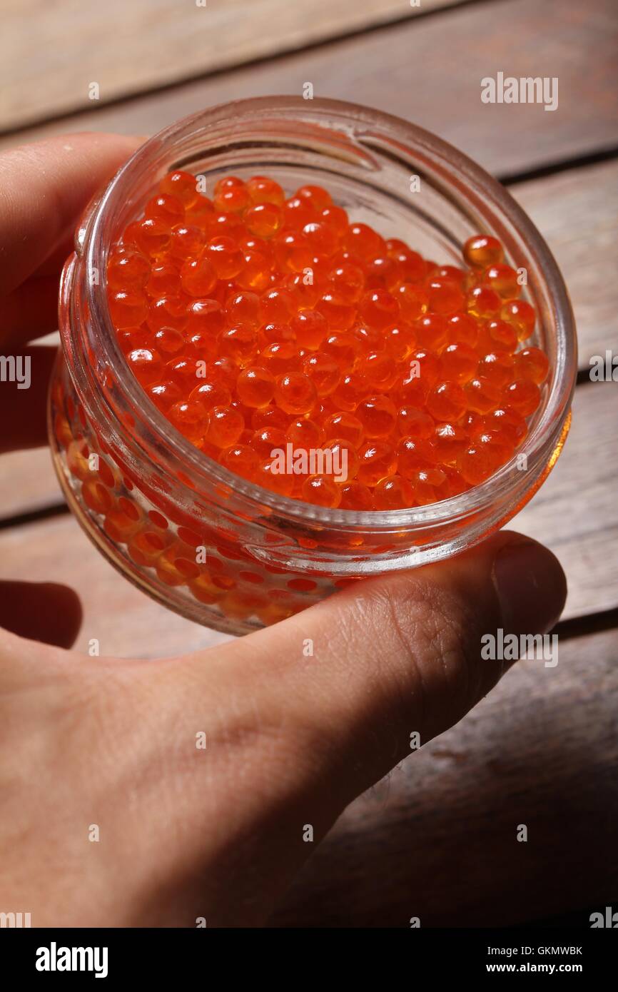 Red caviar hand hi-res stock photography and images - Alamy