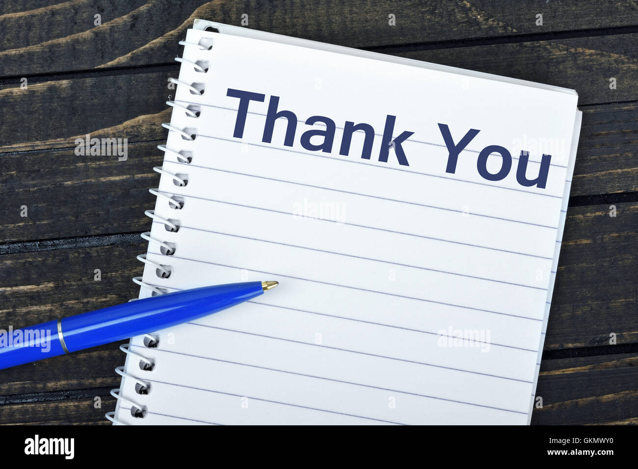 Thank You text on notepad and blue pen Stock Photo - Alamy