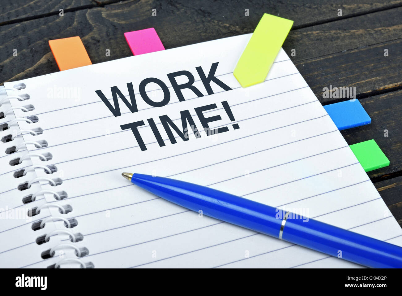 Work time word on notepad and pen Stock Photo - Alamy