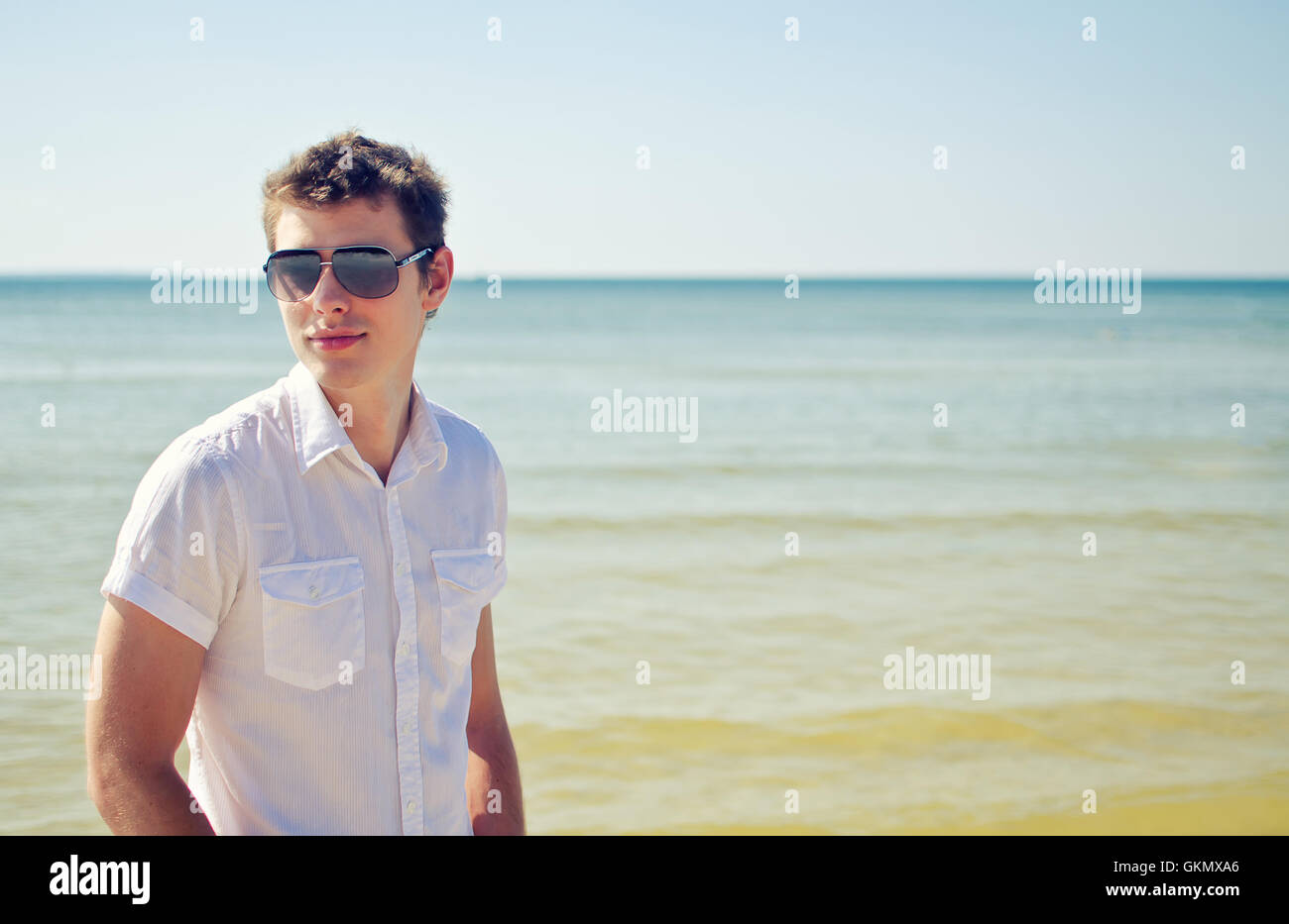 Handsome guy posing relaxing hi-res stock photography and images - Alamy