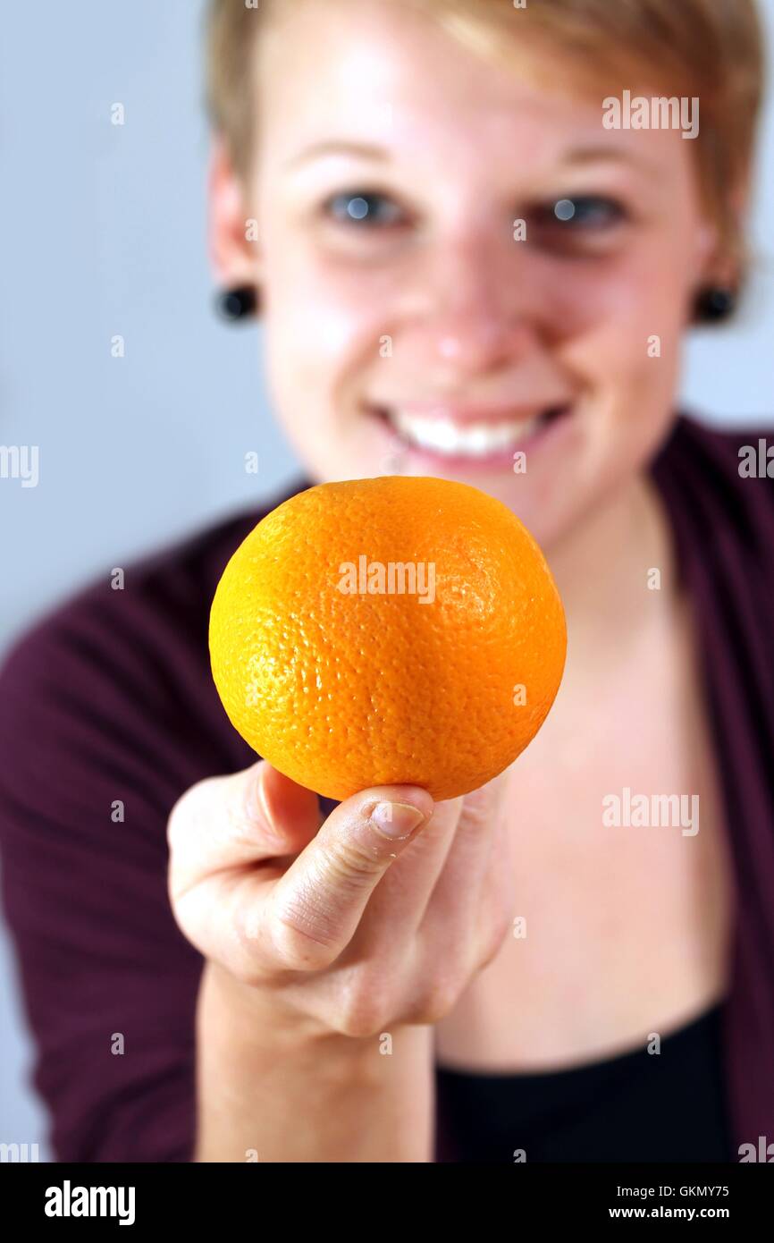 girl balancing an orange Stock Photo - Alamy girl balancing an orange Stock Photo - Alamy