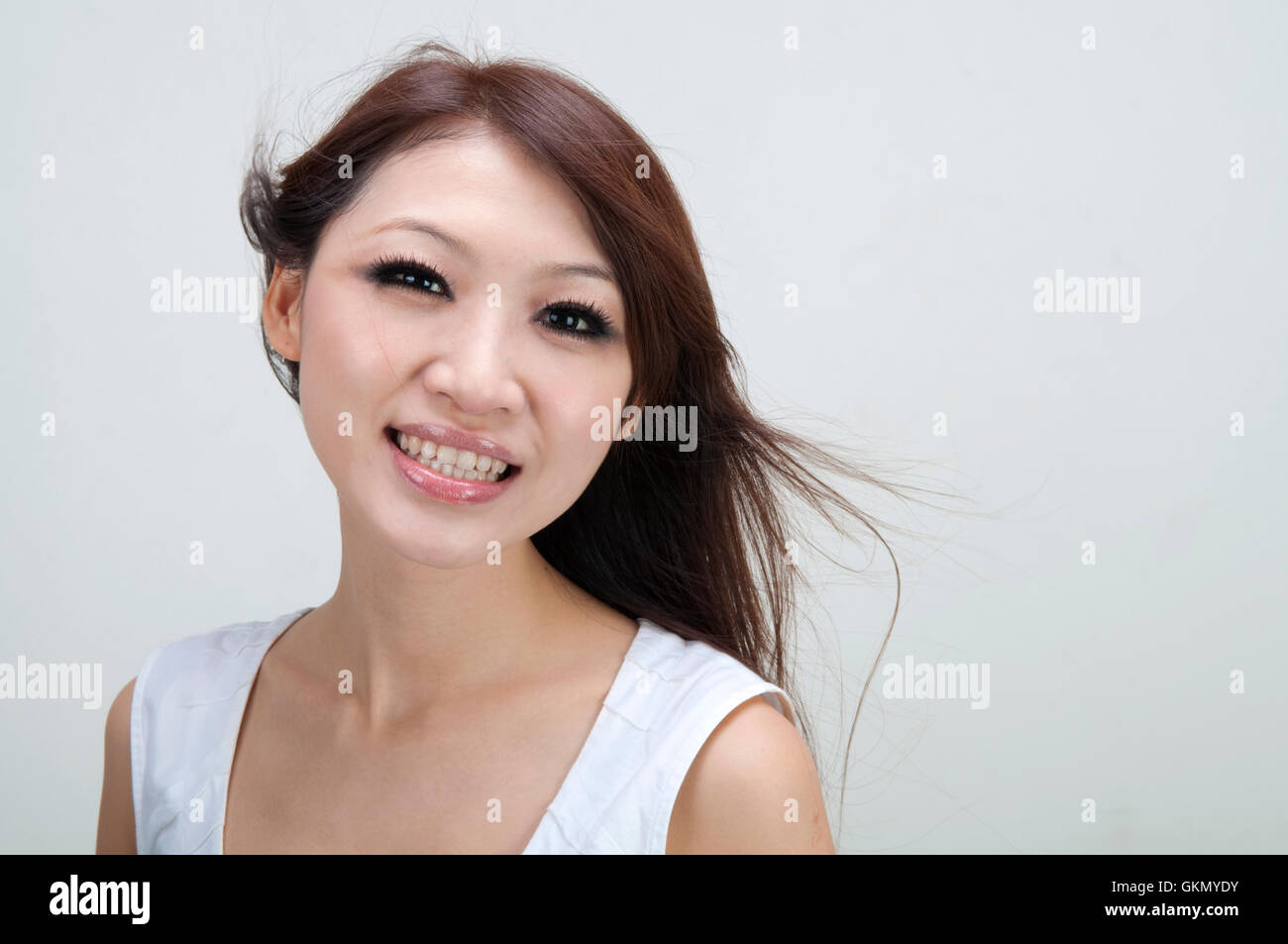 Hair blow wind asian hi-res stock photography and images - Alamy