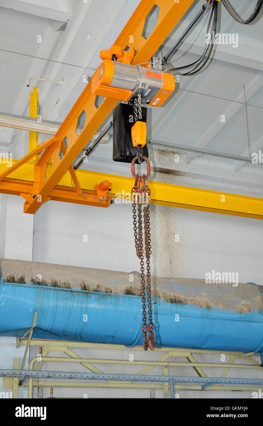Automatic industrial crane at the plant Stock Photo - Alamy