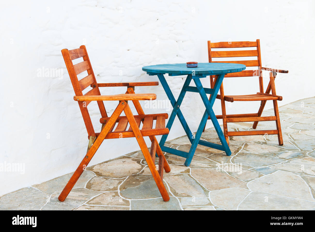 Colorful table and chairs arrangement Stock Photo - Alamy