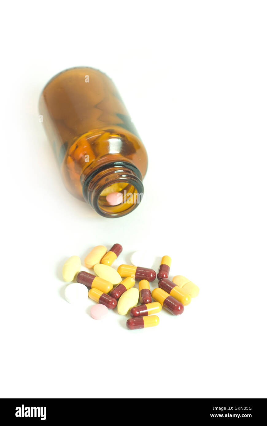 pills spill out from bottle Stock Photo - Alamy