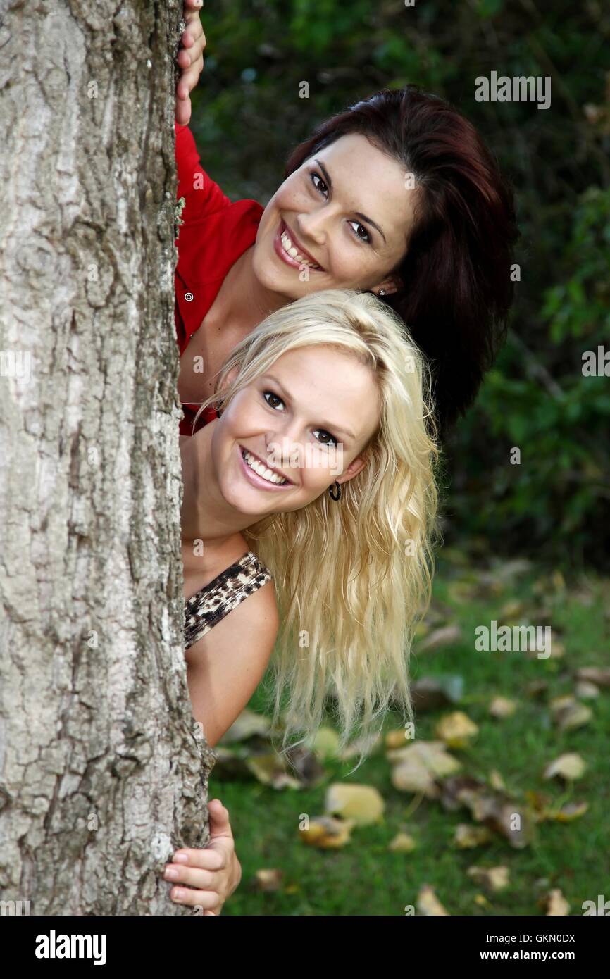 Hide and Seek Pretty Girls Stock Photo - Alamy