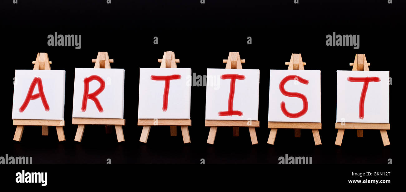 Artist word spelled across six easels on black Stock Photo - Alamy