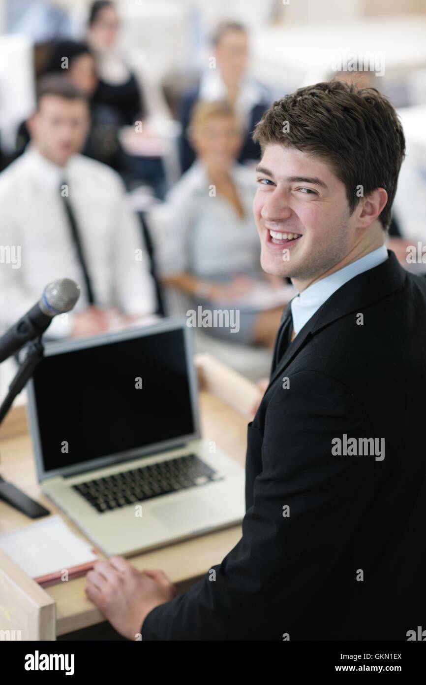 Young business man giving a presentation on conference Stock Photo - Alamy