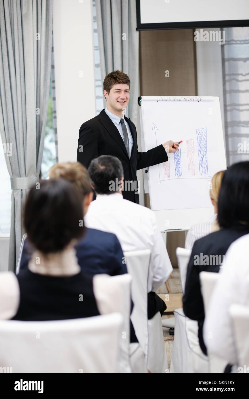 Young business man giving a presentation on conference Stock Photo - Alamy