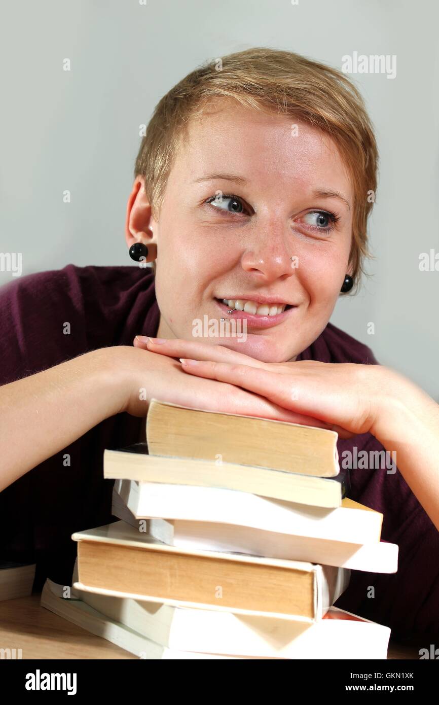 girl with books is thinking Stock Photo - Alamy