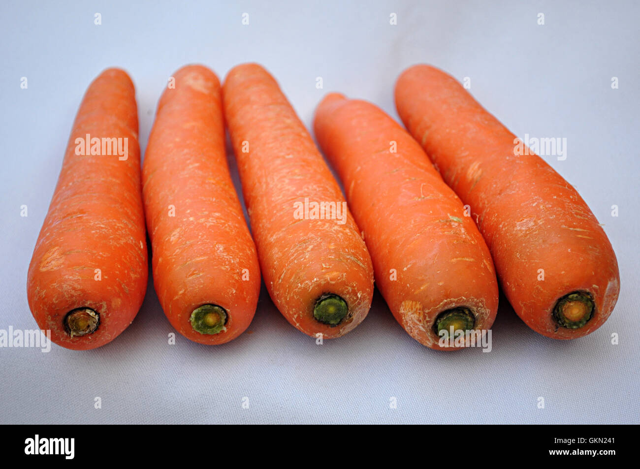 carrots on row Stock Photo - Alamy