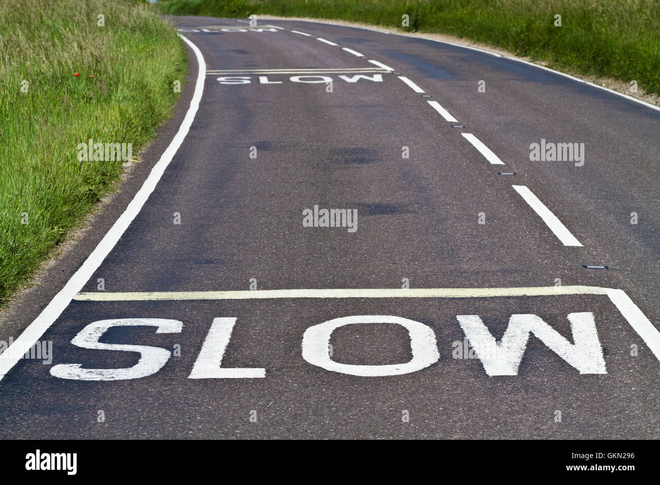 Road Marking Slow Sign Painted High Resolution Stock Photography and ...