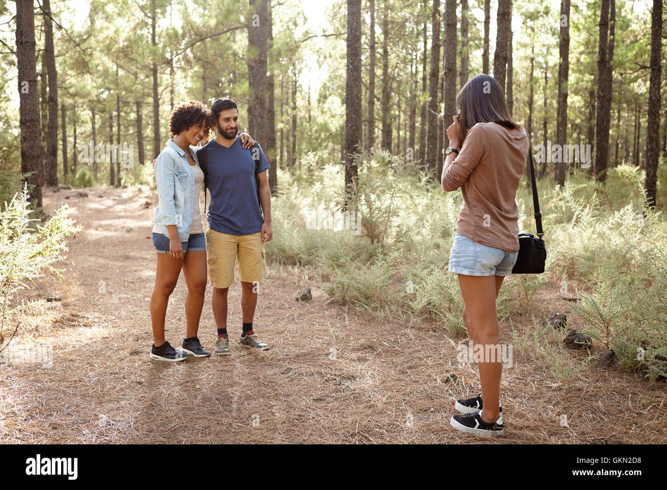 Three friends taking pictures hi-res stock photography and images - Alamy