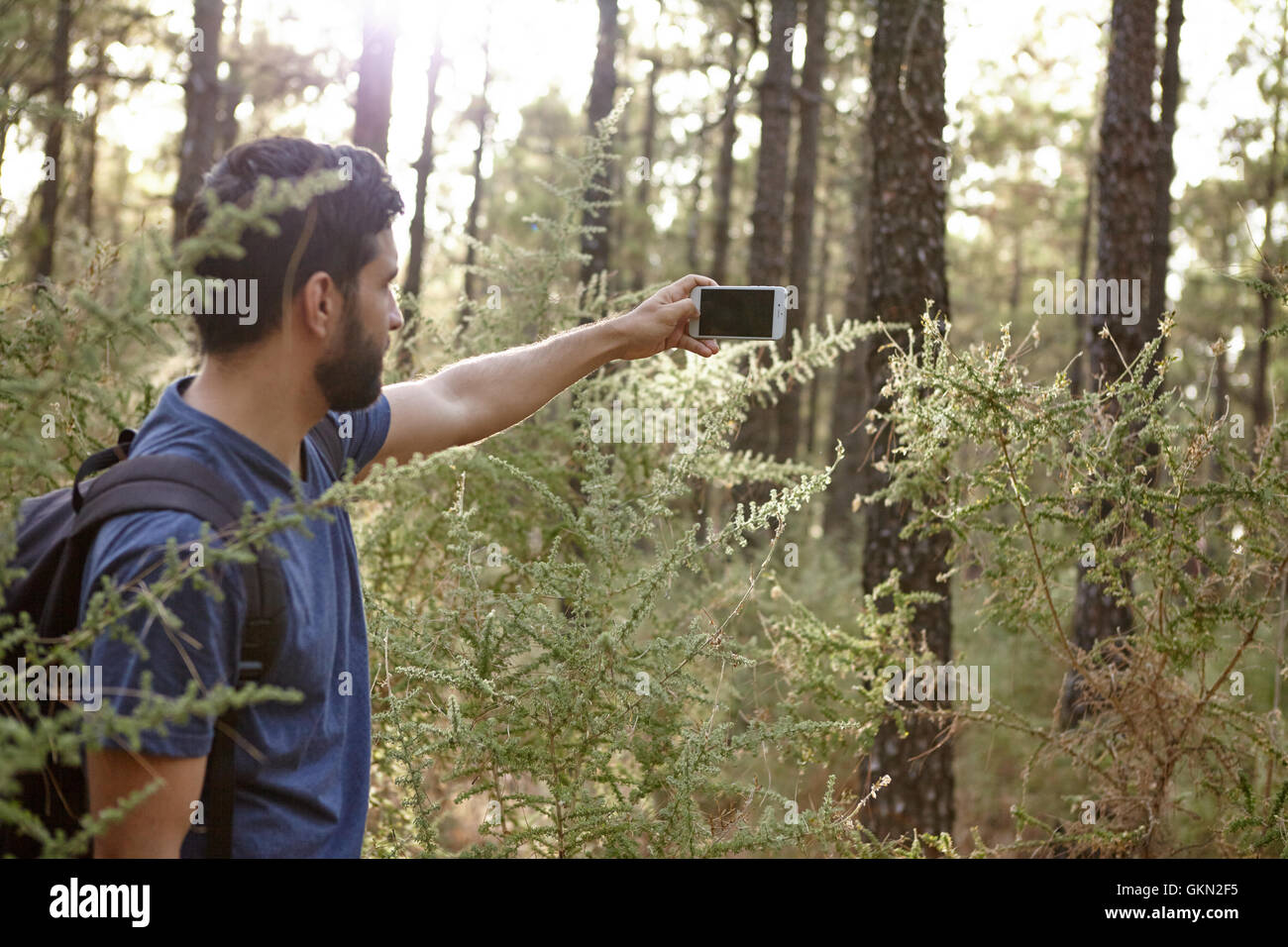Handsome man taking pictures hi-res stock photography and images - Alamy