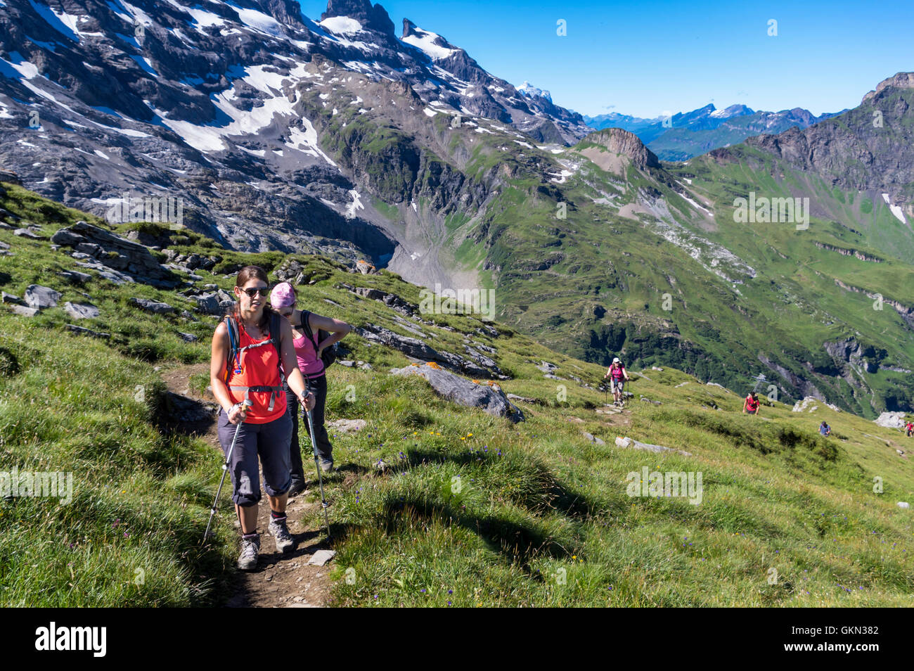 Young Caucasian women hiking in the Swiss Alps. Engelberg, Switzerland ...