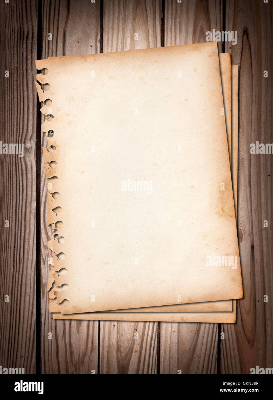 old note papers on brown wood texture Stock Photo - Alamy