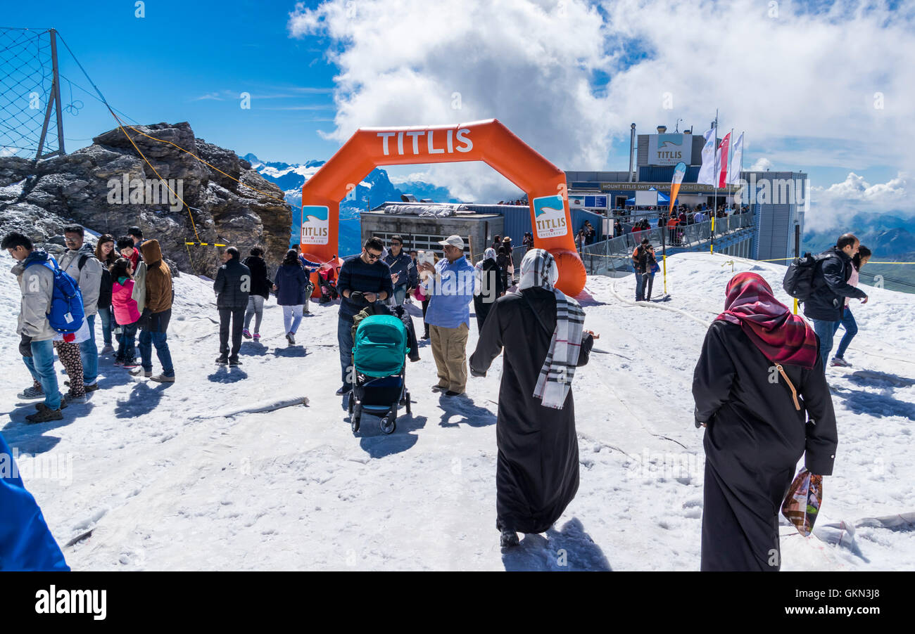 Indian, Asian, and arab tourists on Mount Titlis, Engelberg ...