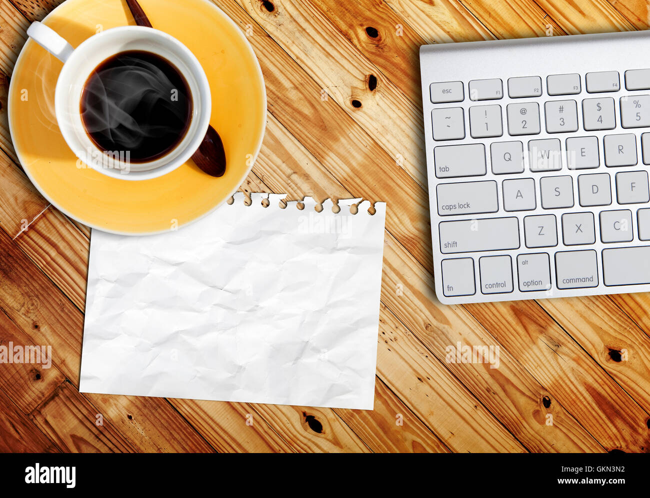 blank paper on wood table with computer keyboard Stock Photo - Alamy