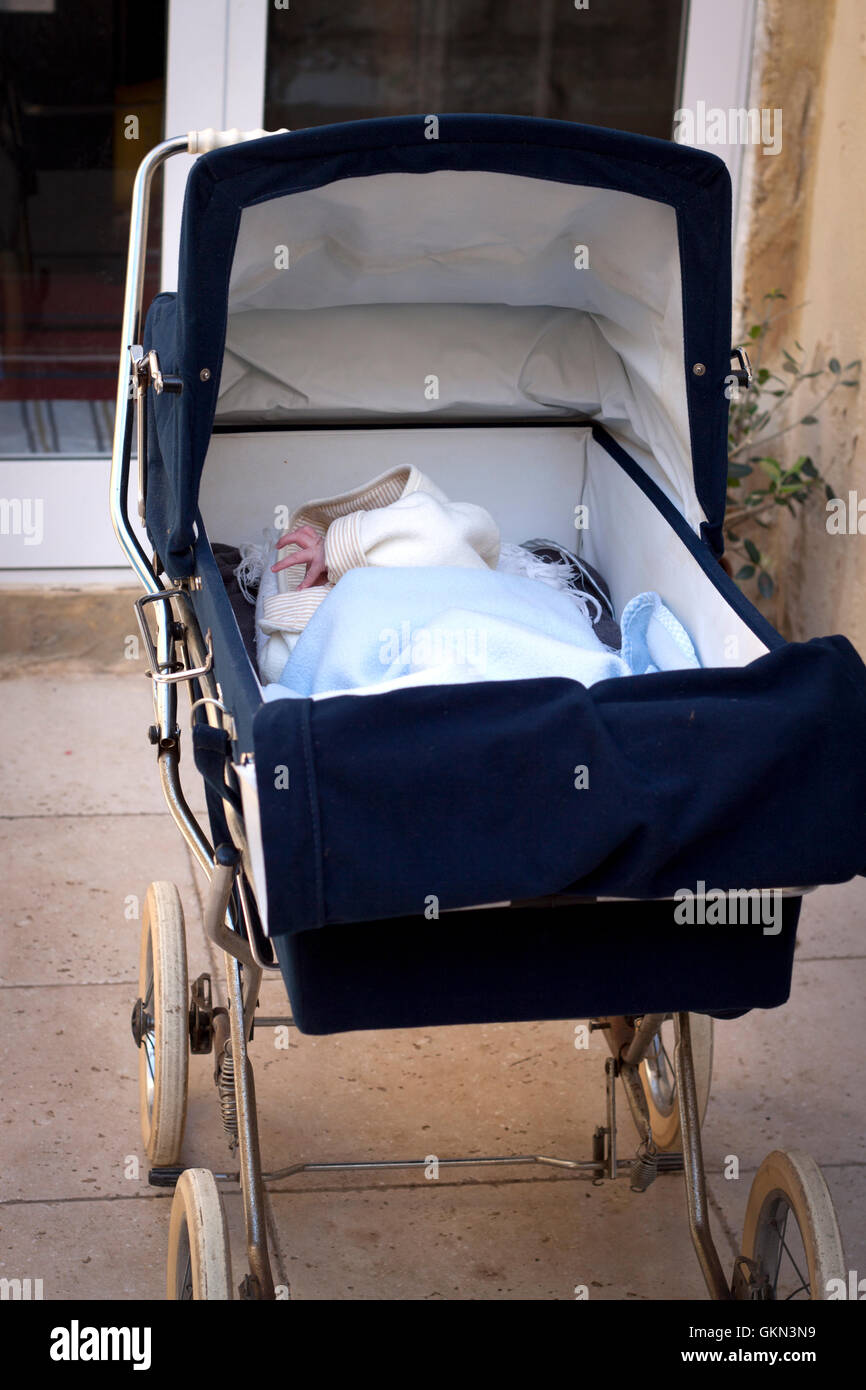 Pram with baby Stock Photo - Alamy