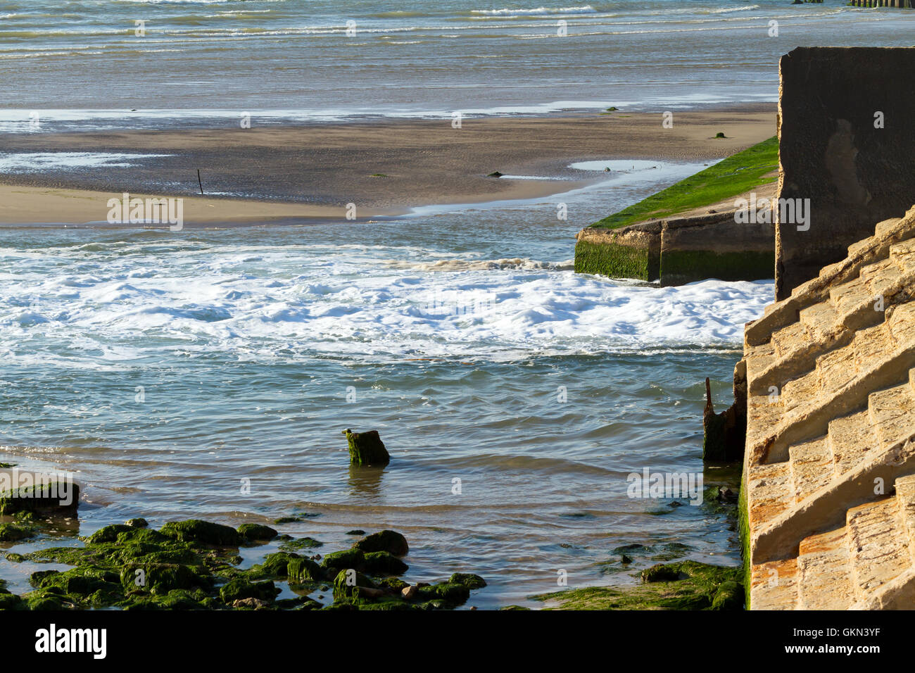 Sewage flows into the sea Stock Photo - Alamy