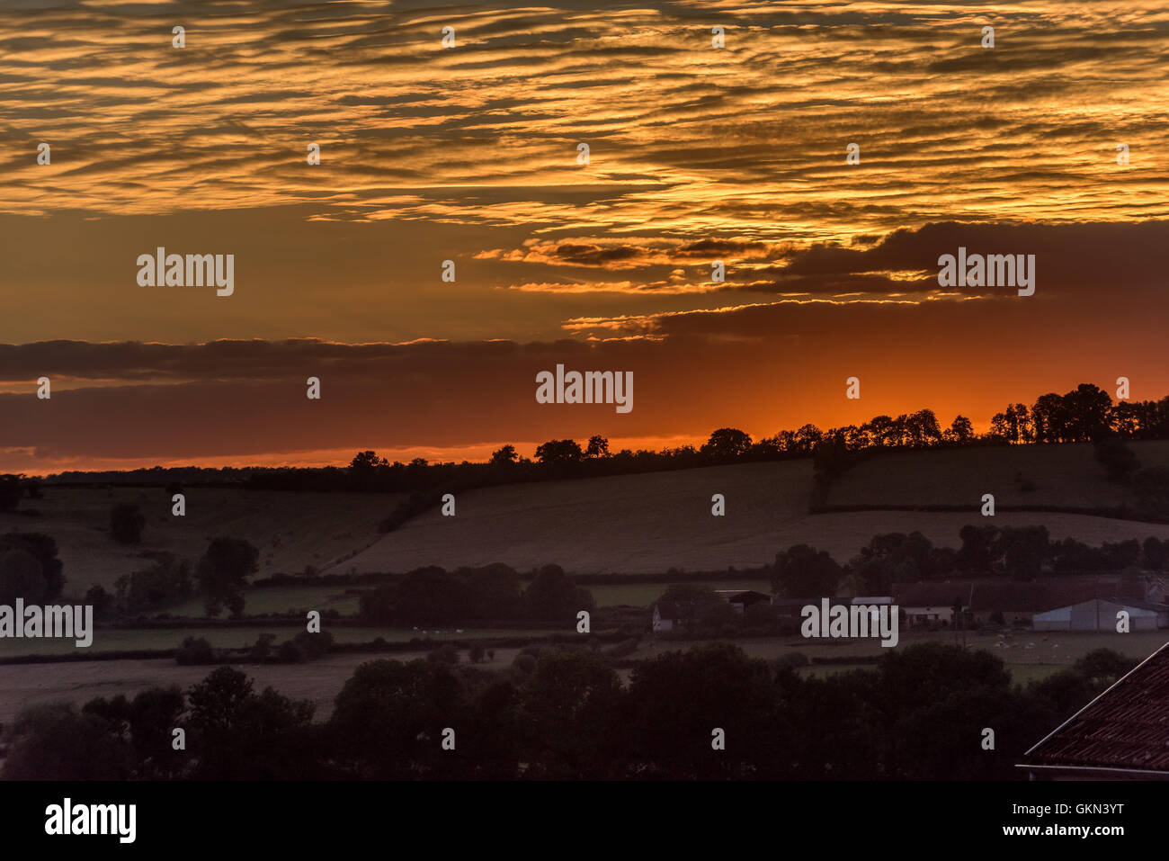 Clouds and sunset in Burgundy Stock Photo - Alamy