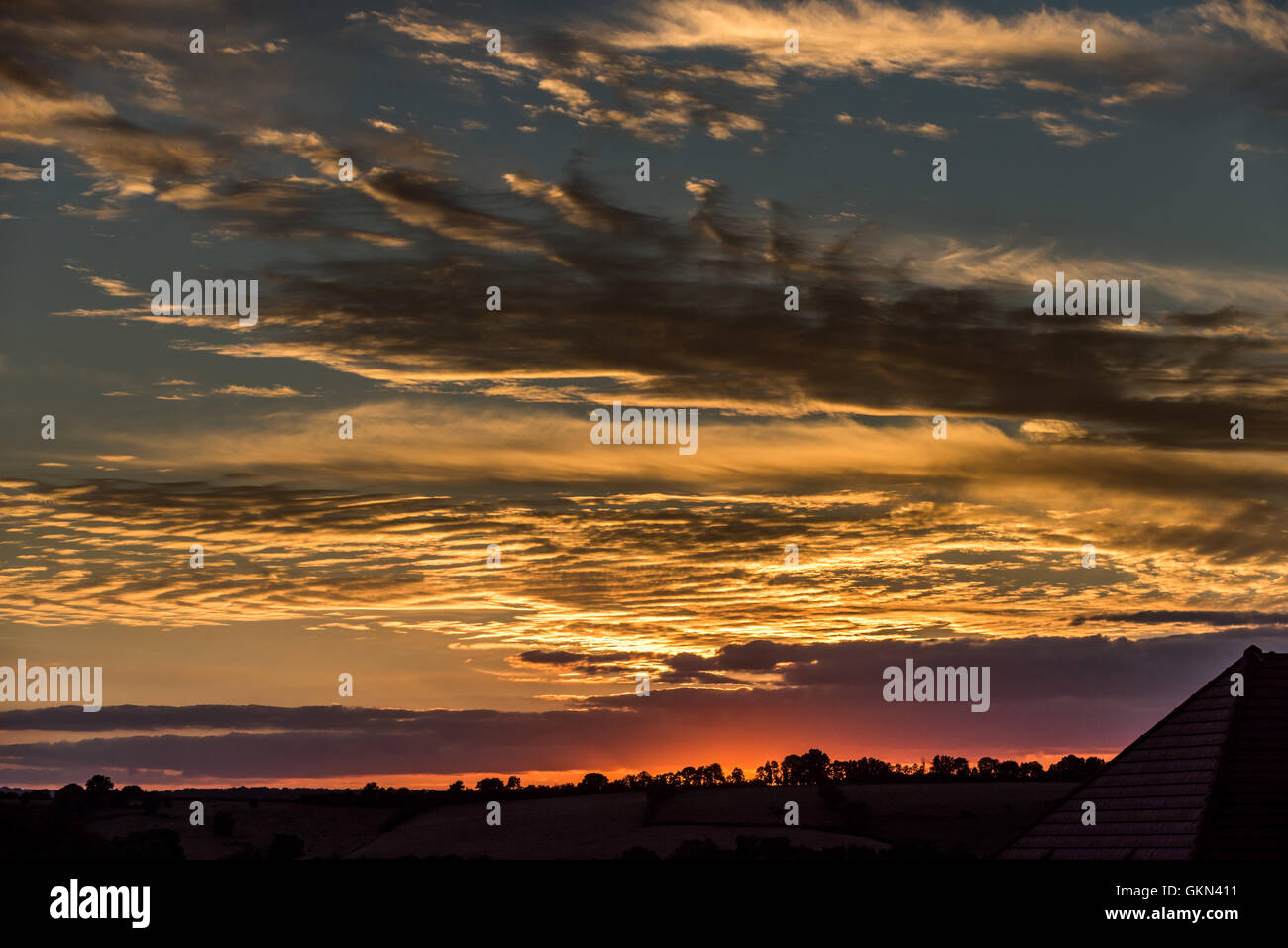 Clouds and sunset in Burgundy Stock Photo - Alamy