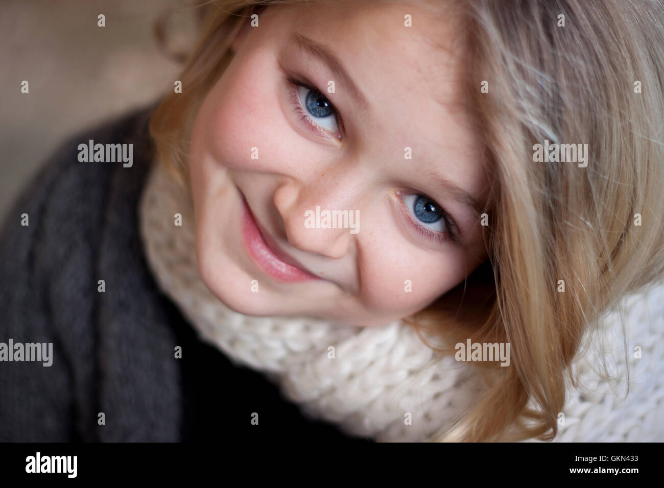 Portrait of a girl smiling at the camera Stock Photo - Alamy