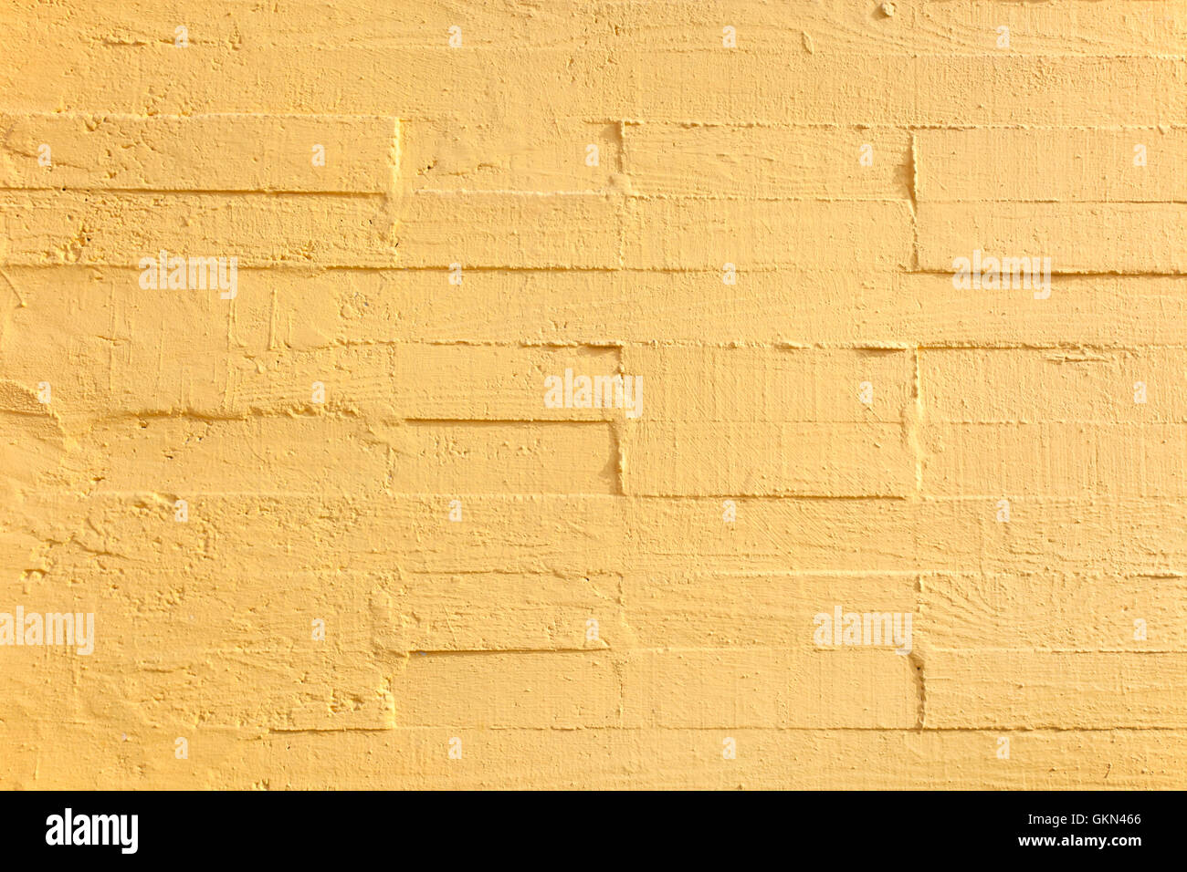 yellow concrete wall texture Stock Photo - Alamy