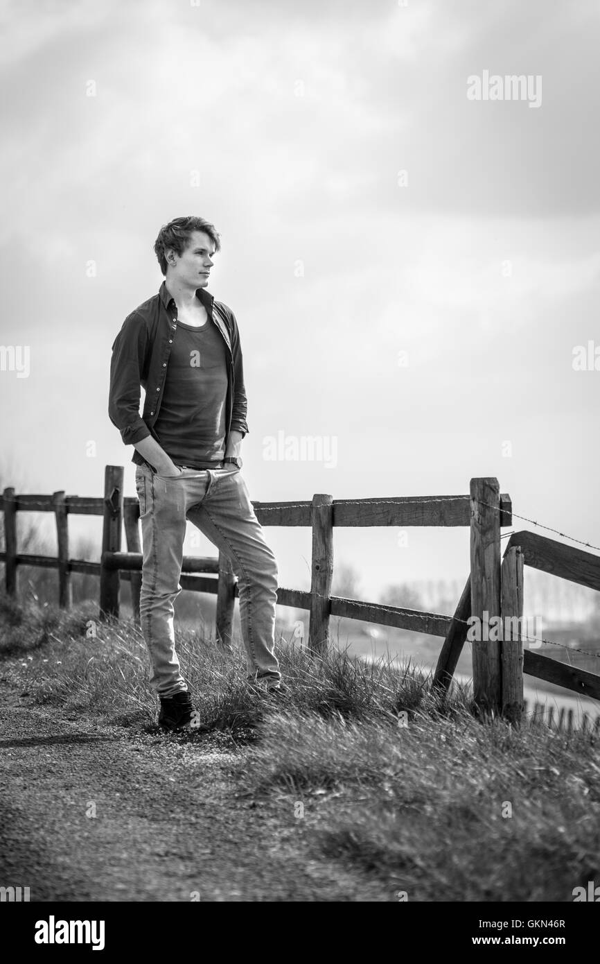 Model posing in meadow Stock Photo - Alamy