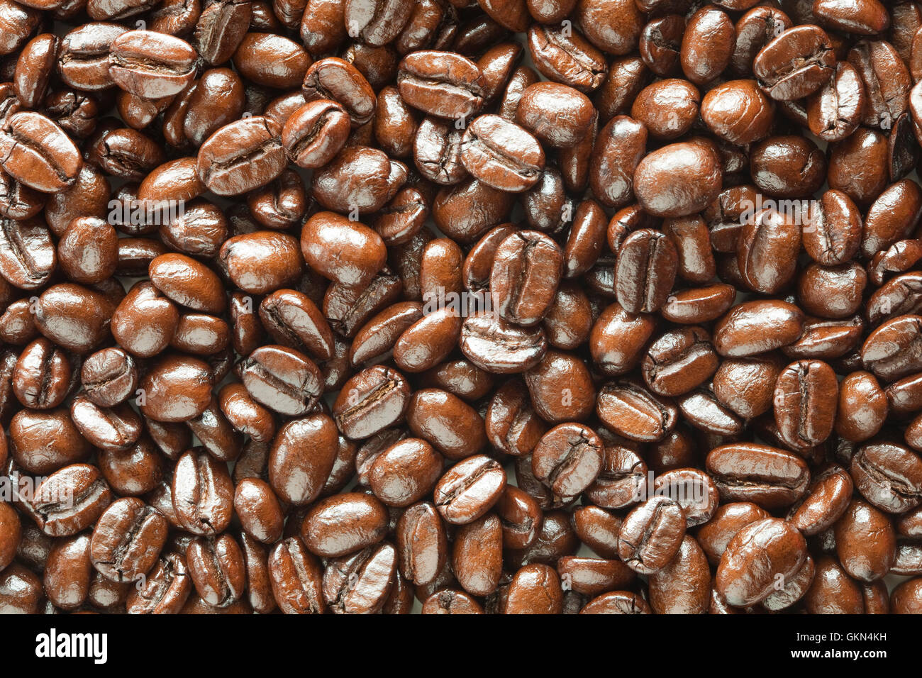 many coffee beans background texture Stock Photo - Alamy