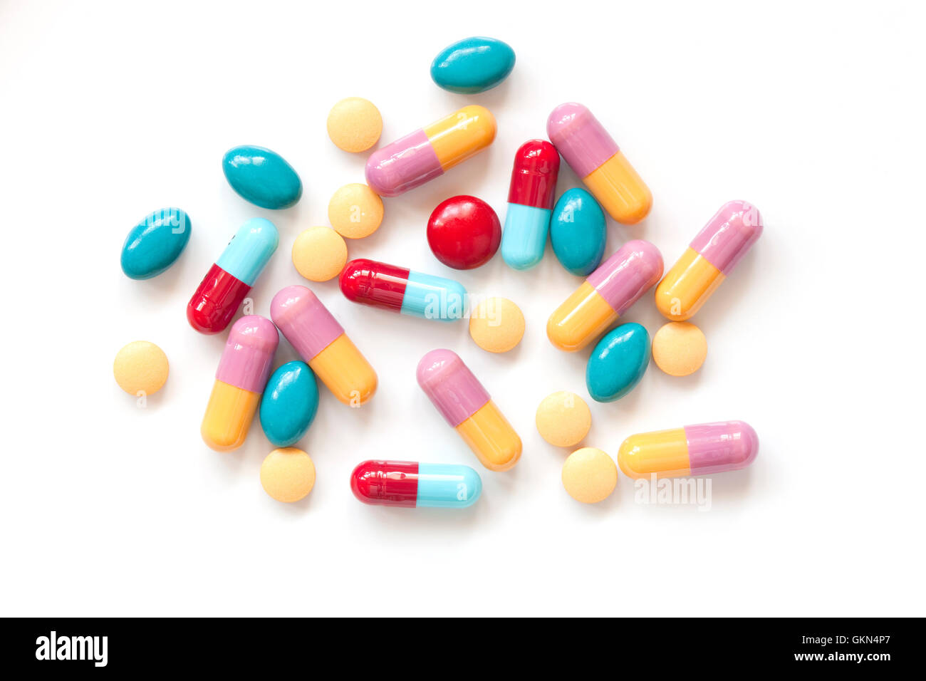 Colorful pill tablets on white background Stock Photo - Alamy