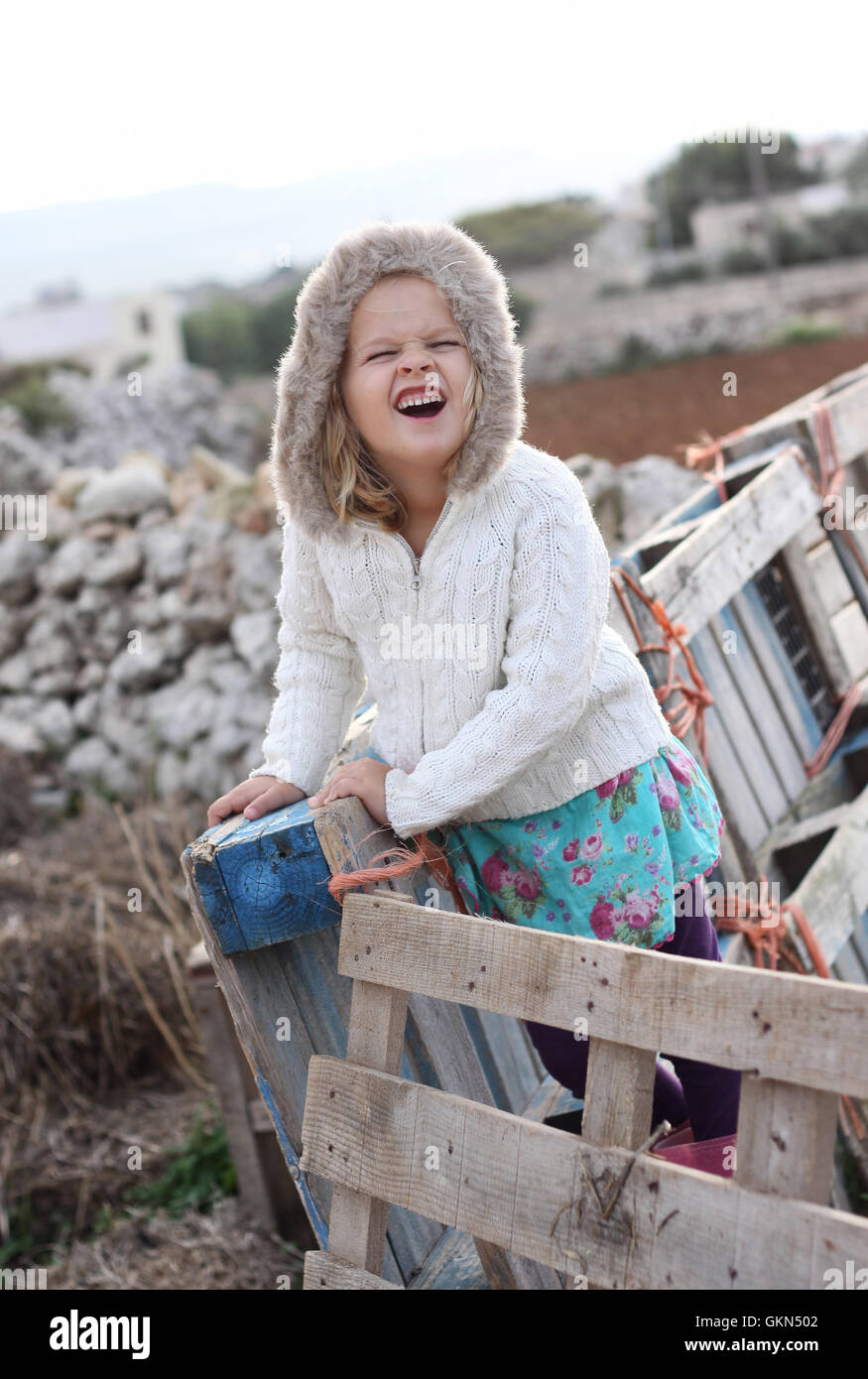 Girl doing silly face Stock Photo - Alamy