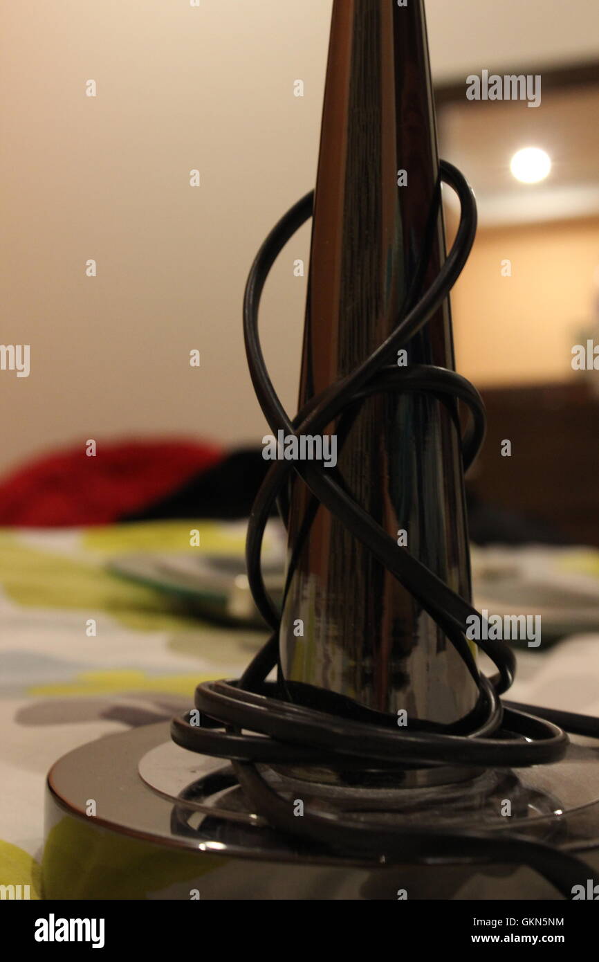 Lamp base with wire wound around it, abstract wire and depth of field ...