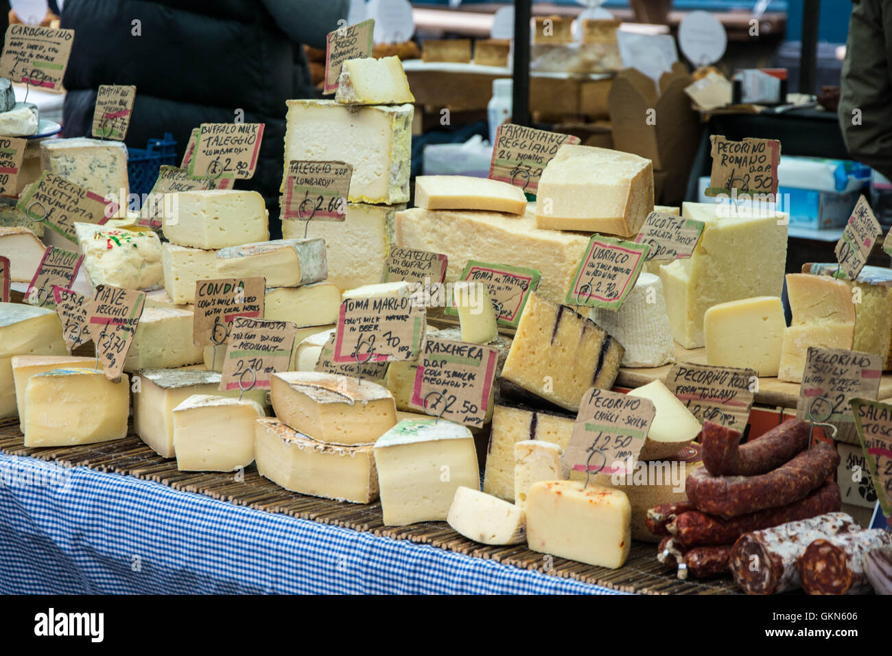 Cheese stand at a London food market Stock Photo - Alamy