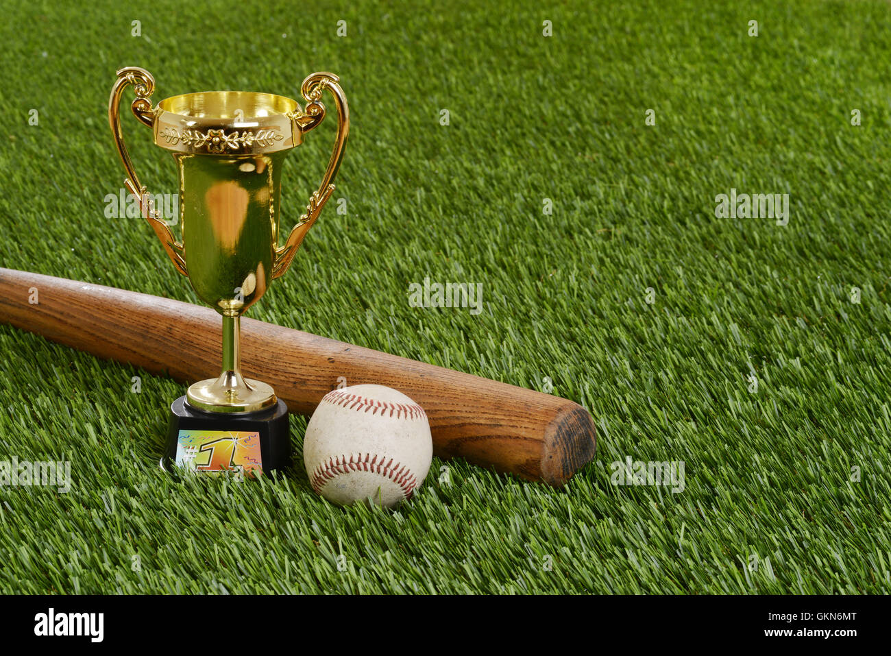 closeup baseball trophy with bat and hard ball Stock Photo - Alamy