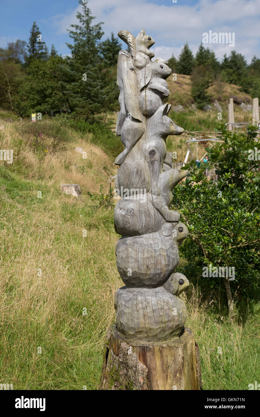 Carved wooden wildlife totem pole Bwlch Nant Yr Arian Visitor Centre ...