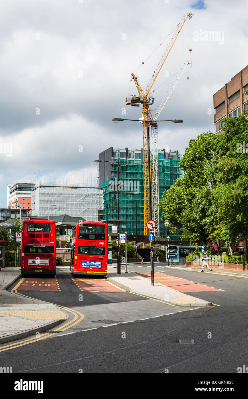 Two Red London Buses Parked in a Town or City Center Near London With ...
