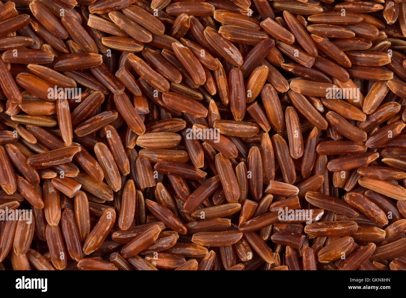 close up of background of raw red rice Stock Photo - Alamy