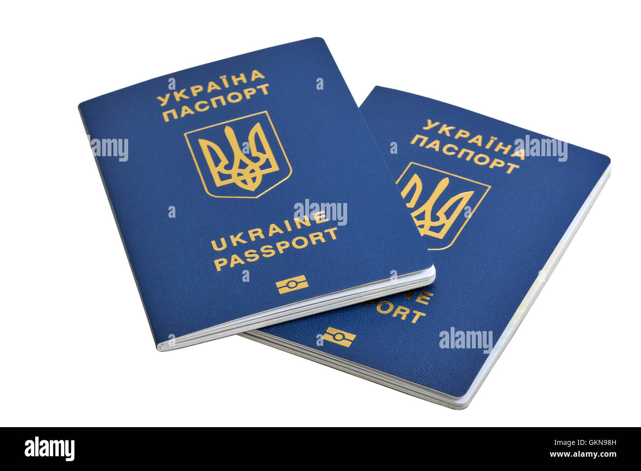 Ukrainian biometric passports isolated on white background closeup ...