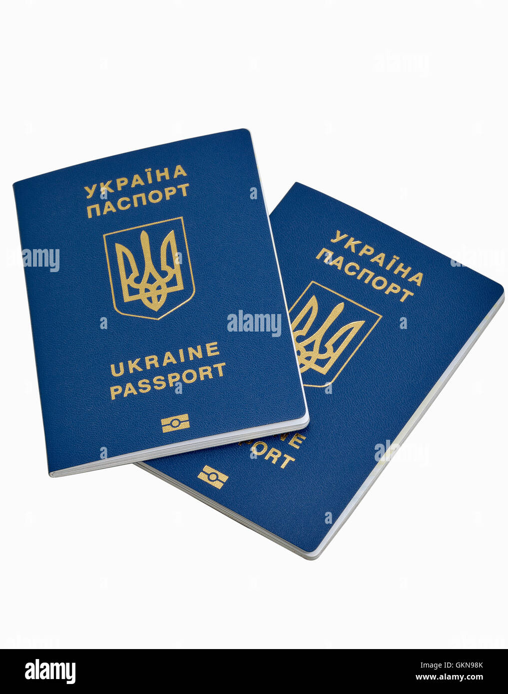 Ukrainian biometric passports isolated on white background closeup ...